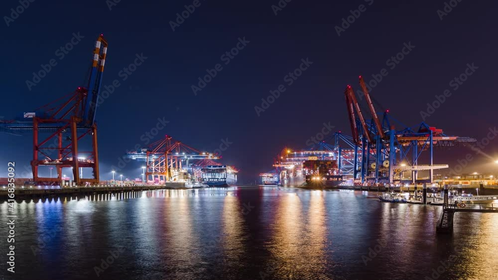 Container ship loading and unloading in deep sea port, Low angle View ...