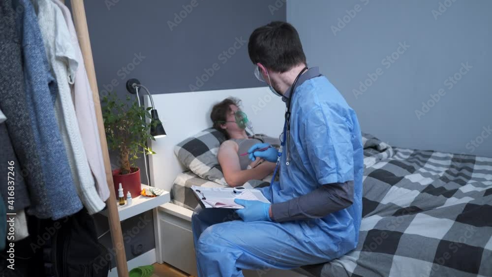 Covid 19, coronavirus. Doctor home visiting during quarantine, patient ...