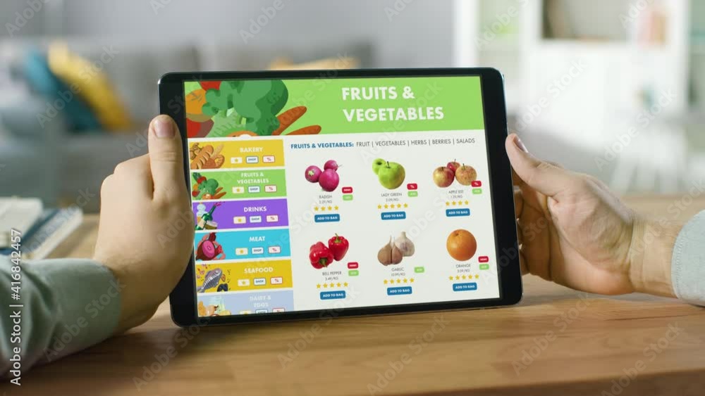 Person Uses Tablet Computer with Touch Screen, Browsing through Online ...