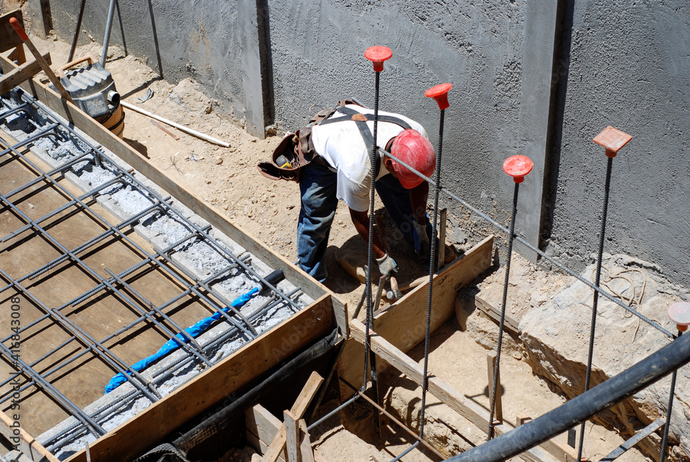 Mason setting concrete forms Stock Photo | Adobe Stock