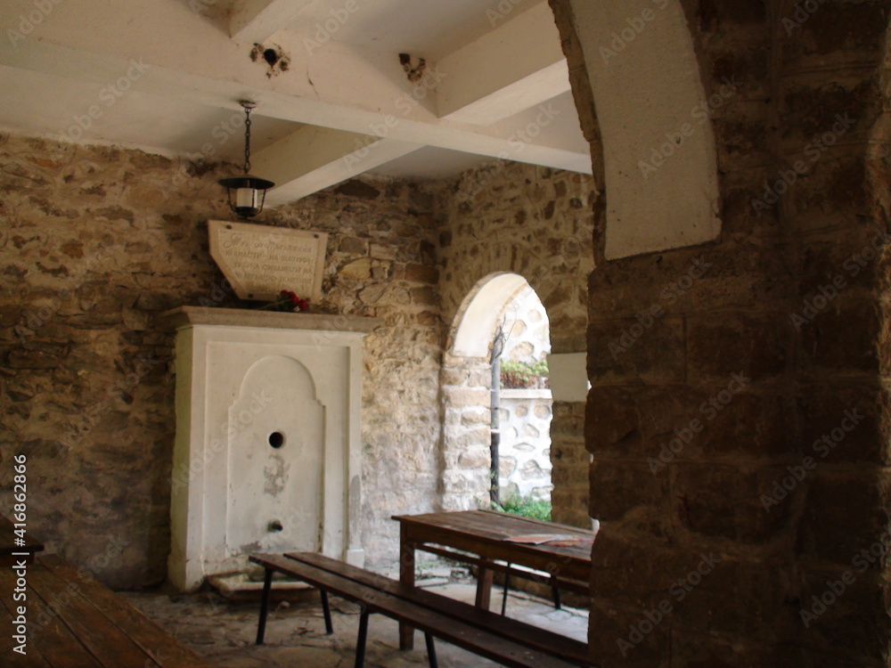 The beautiful stone walls of an ancient monastery displaying the ...