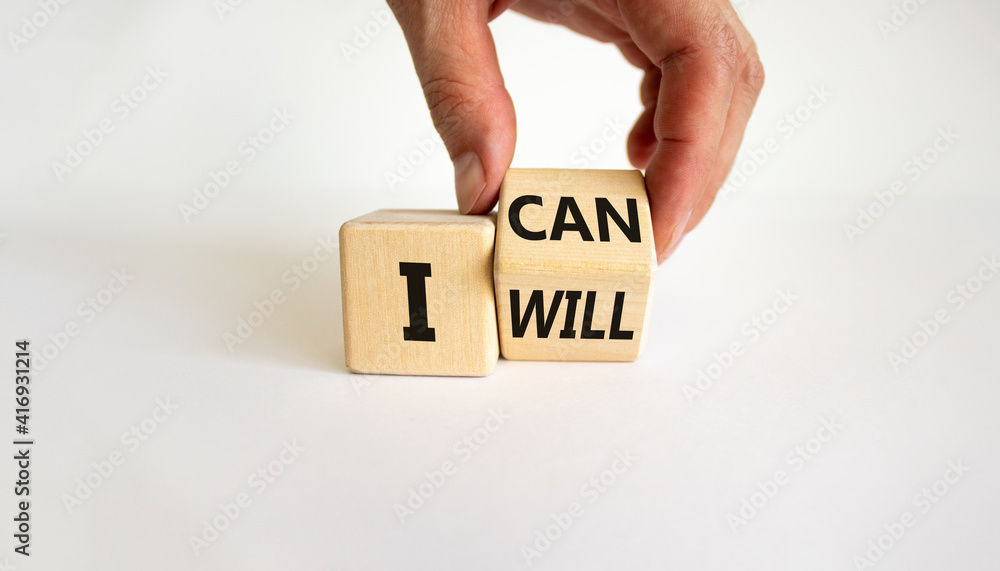 I can and will symbol. Businessman turns cubes and changes words i can ...