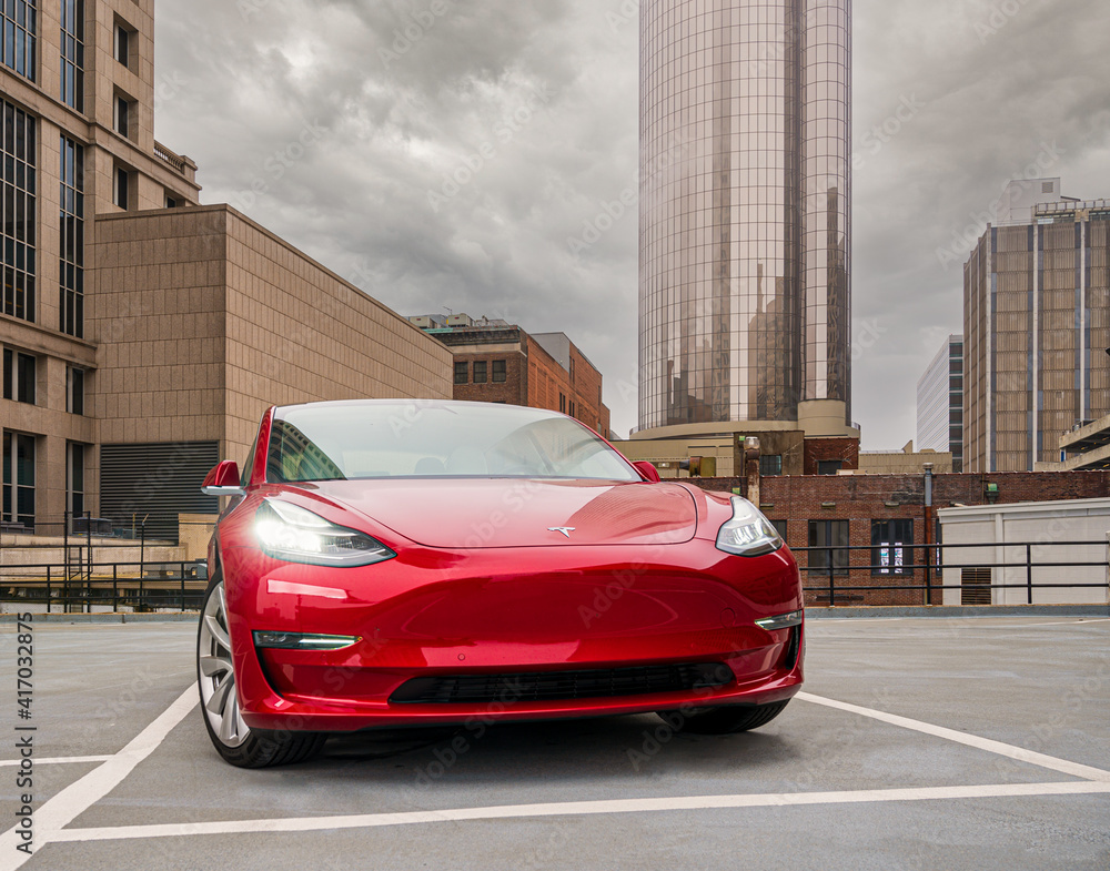 Tesla Model 3 on rooftop lot in Downtown Atlanta Stock Photo | Adobe Stock