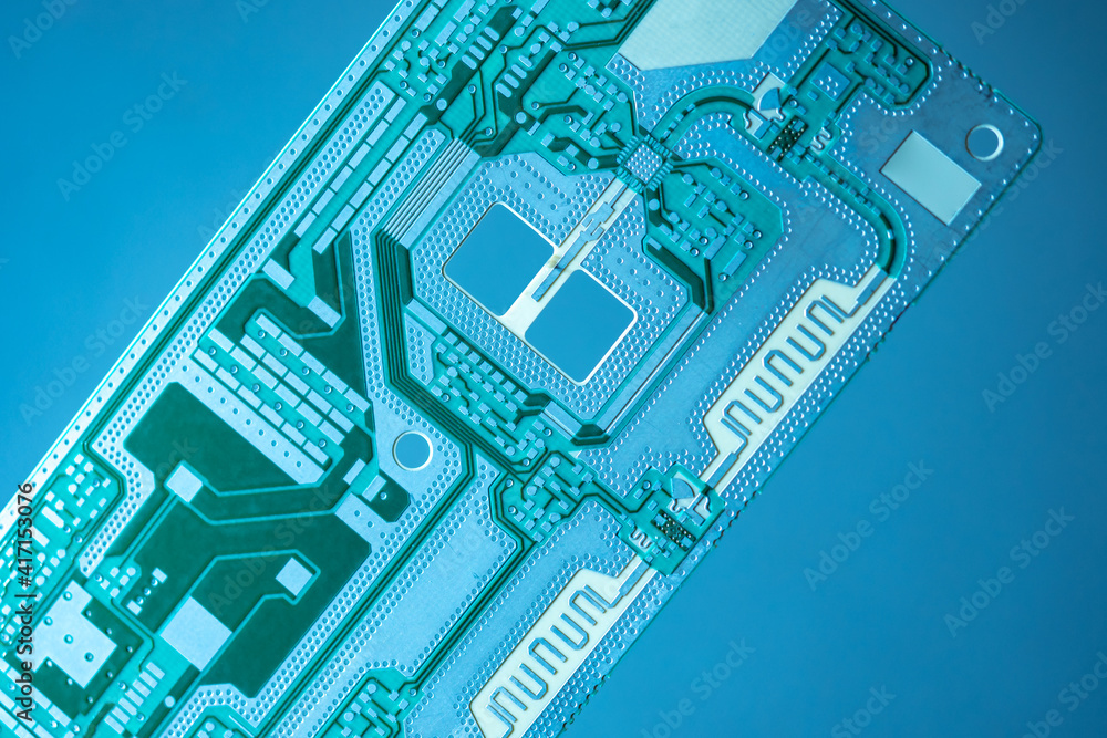 PCB background. Tukstura with microcircuit close-up. Fragment of PCB ...