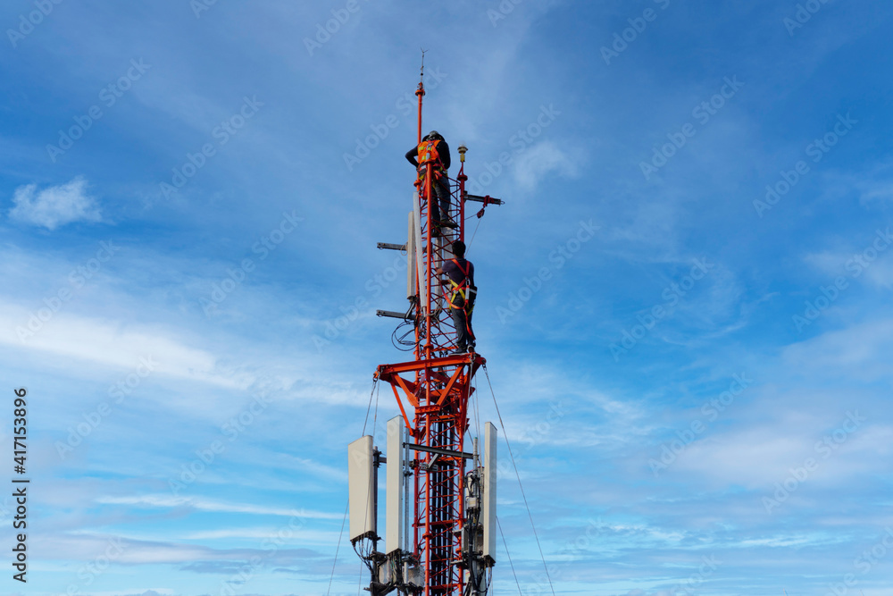Engineer maintenance on telecommunication tower doing ordinary ...