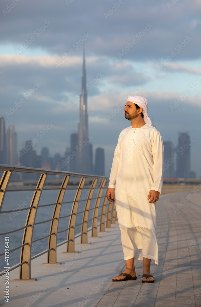 emirati man in traditional clothing in Dubai Stock Photo | Adobe Stock