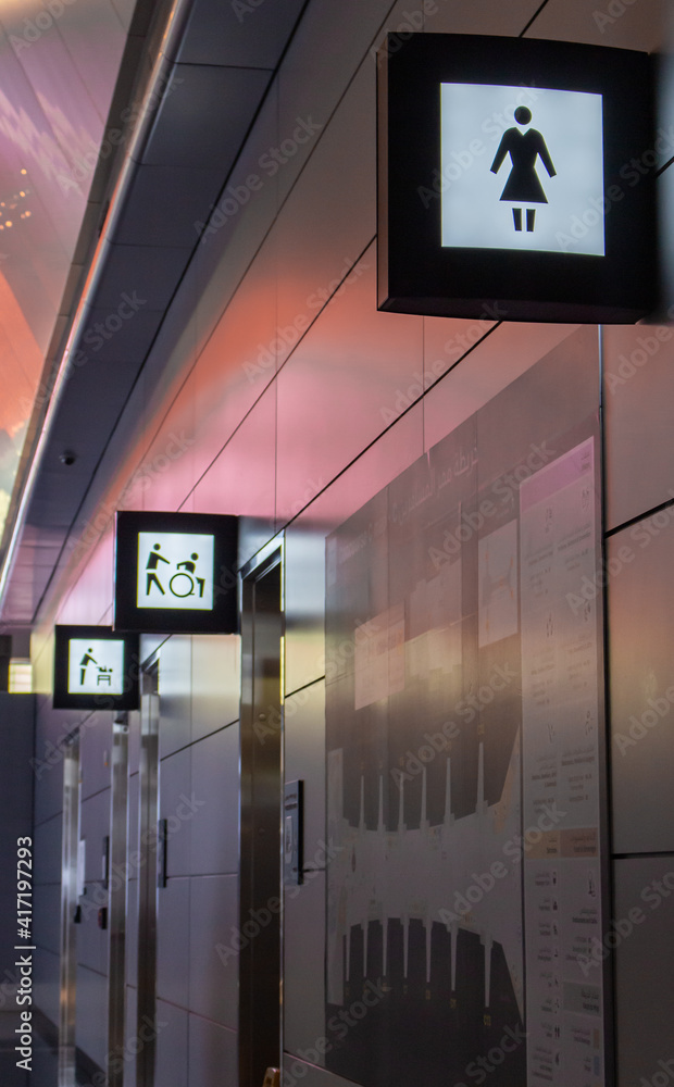 Toilet sign in airport. Public WC symbol. Washroom direction in airport ...