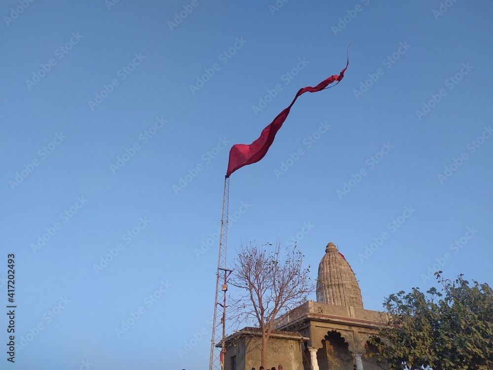 Big red flag with Hindu temple Stock Photo | Adobe Stock