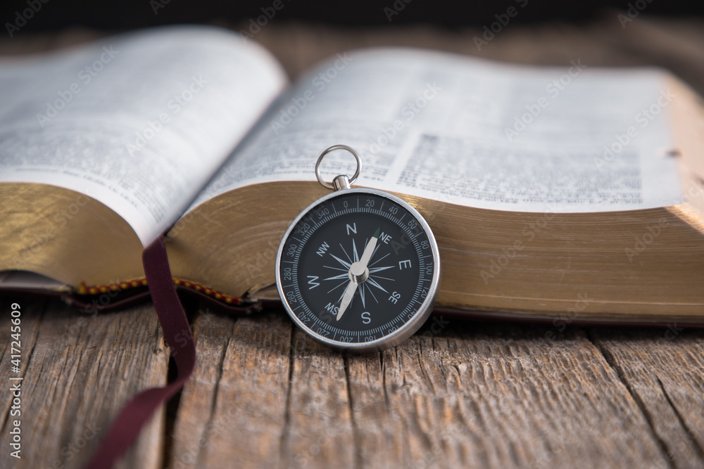 compass with the Holy Bible Stock-Foto | Adobe Stock