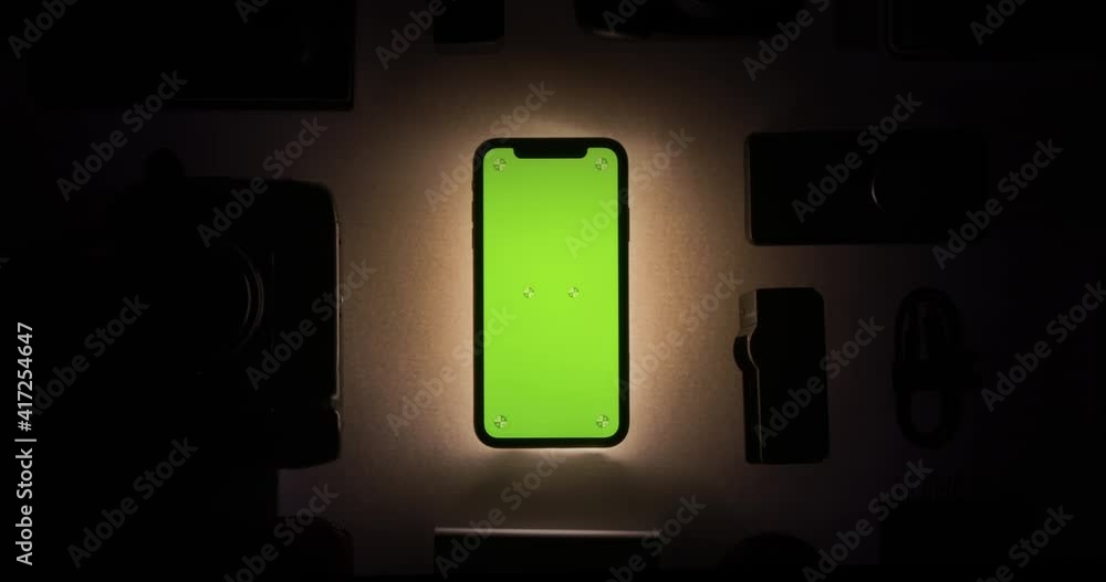 Chroma key, green screen closeup shot of a phone, a smartphone with ...