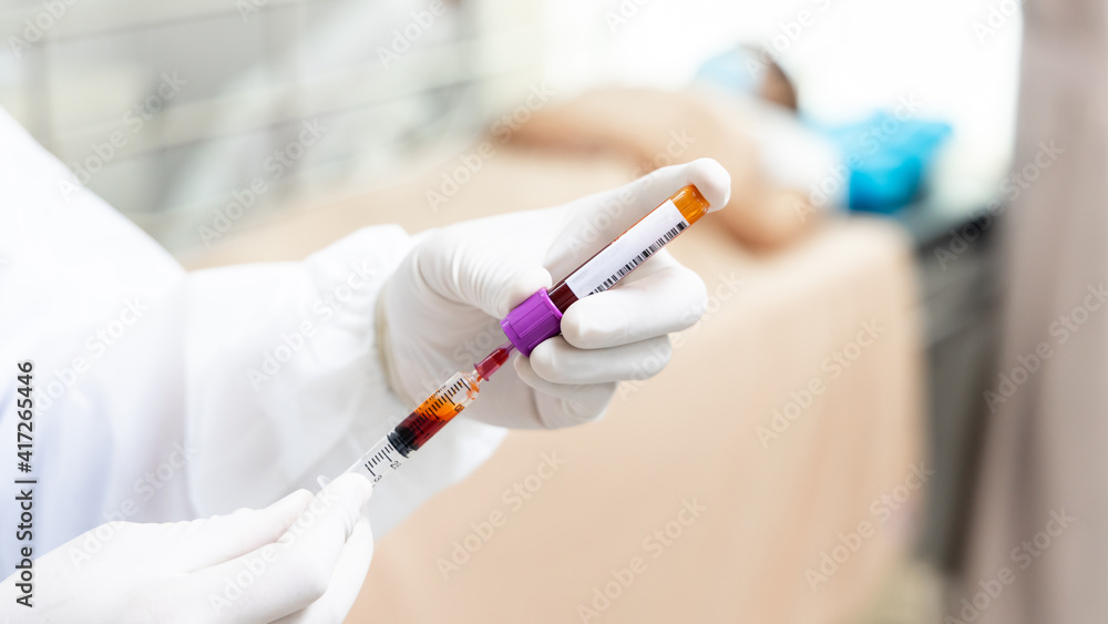 Hand of nurse, doctor or medical technologist in white gloves with ...