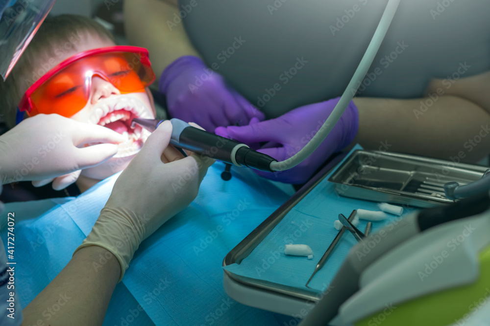 Kids dentistry. Children's dentist examination baby teeth. Emotions of ...