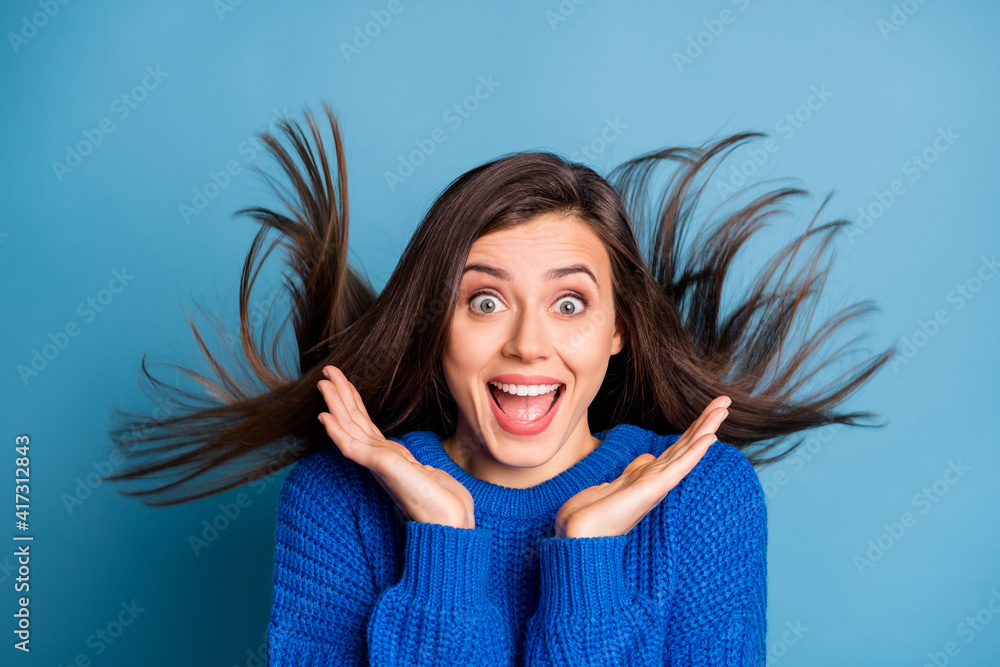 Portrait of young happy crazy shocked amazed smiling girl with flying ...