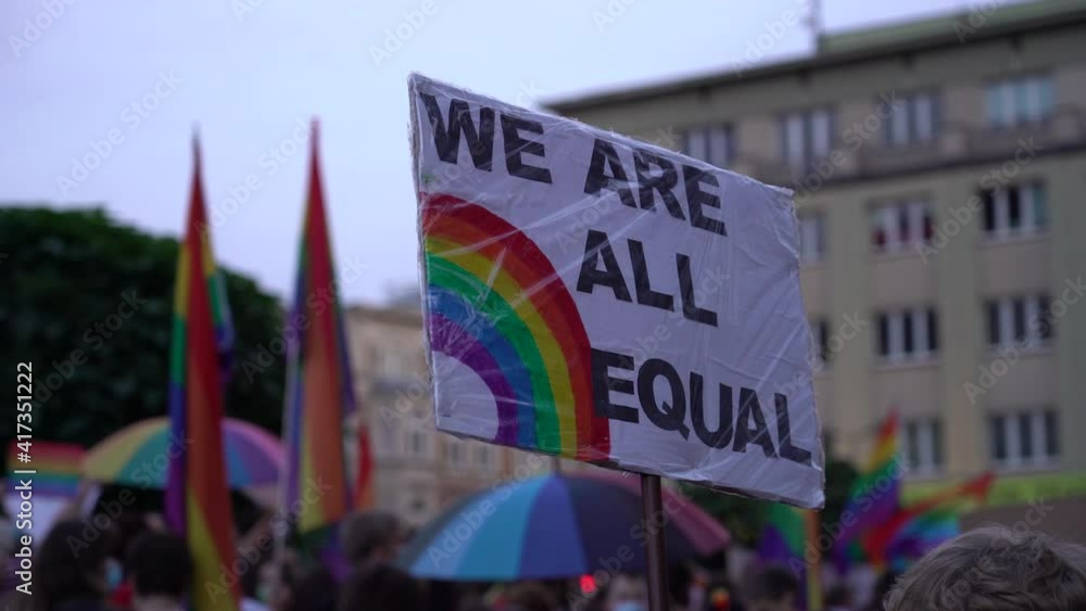 LGBT equality march. Fight for LGBTQ+ rights. Rainbow flags, banners ...