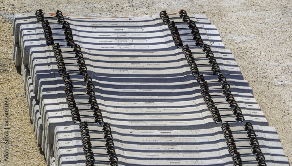 Pile of precast concrete sleepers ready for construction in trackwork ...