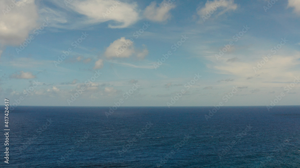 Blue ocean with waves and sky with clouds, seascape top view. Water ...