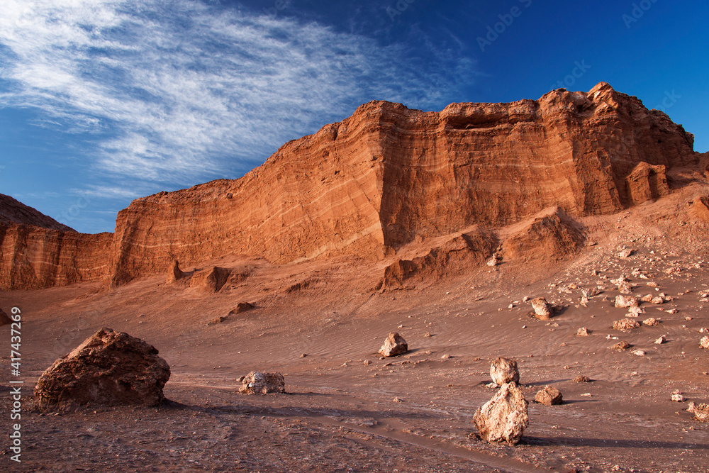 Rocky cliffs of the amphitheater in the evening sun, under a beautiful ...
