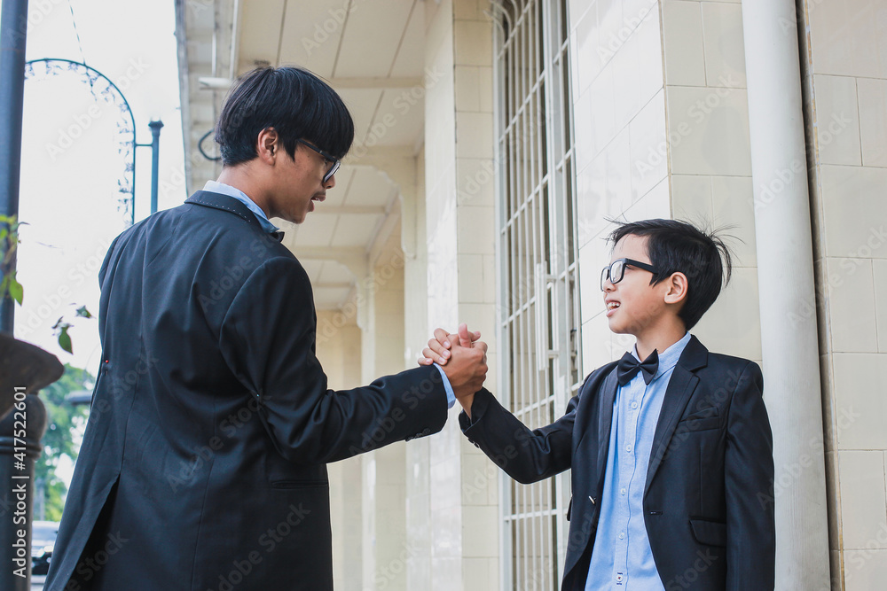 Two brothers with vintage suit wearing glasses, black ribbon and ...