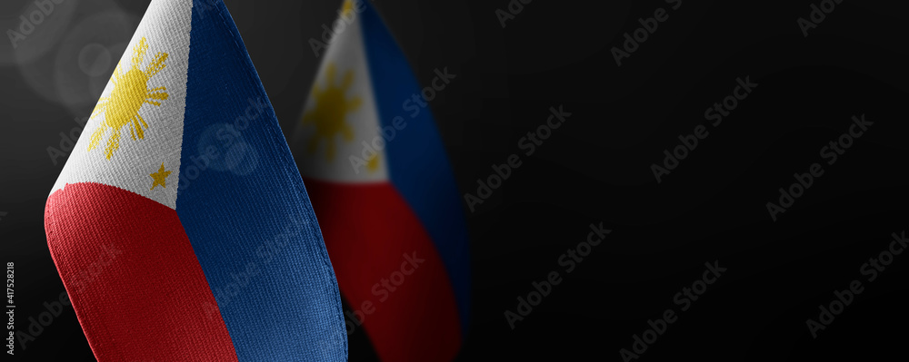 Small national flags of the Philippines on a dark background Stock ...