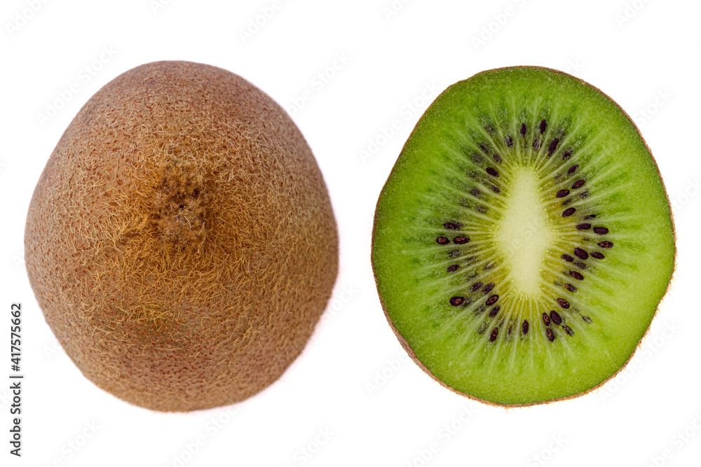 Kiwi fruit cut on two isolated on white background top view. Pulp and ...