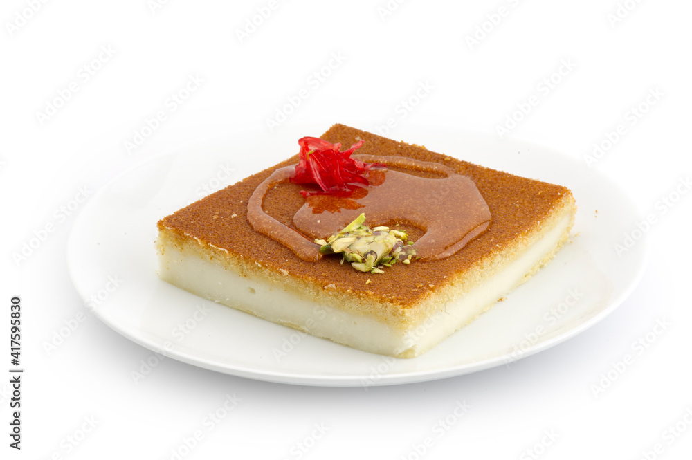 Turkish dessert kunefe, kunafa, kadayif with pistachio powder and ...