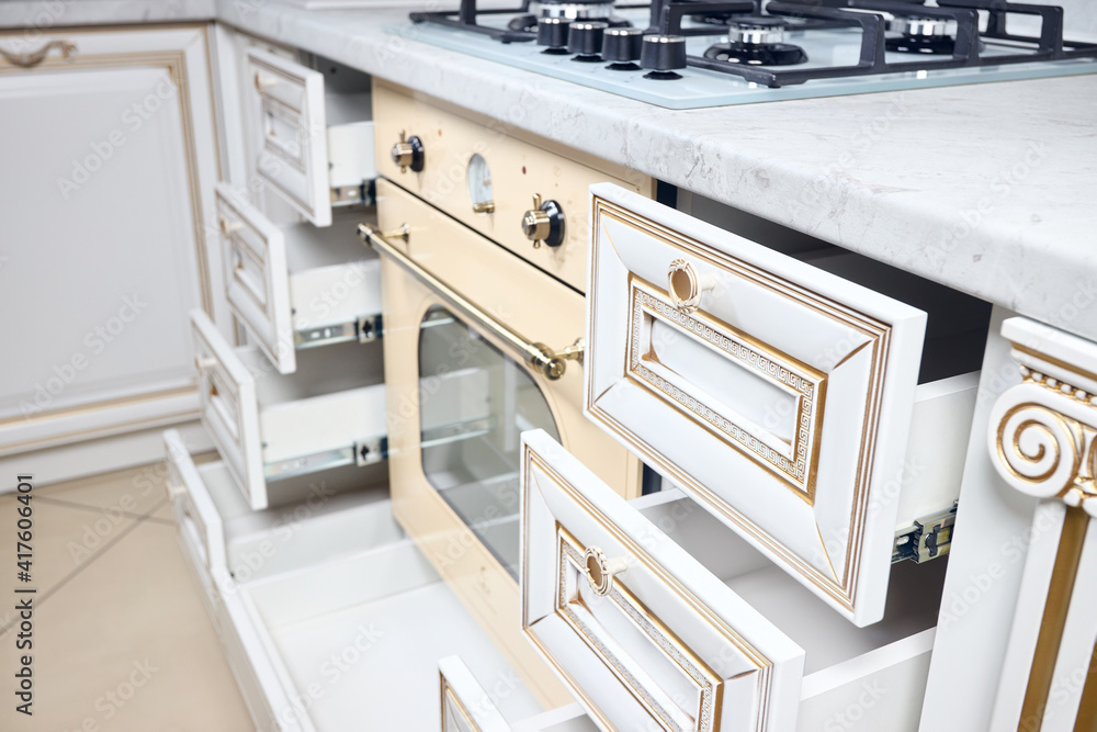 Kitchen drawer pullout cabinet. Interior of modern kitchen in classic ...
