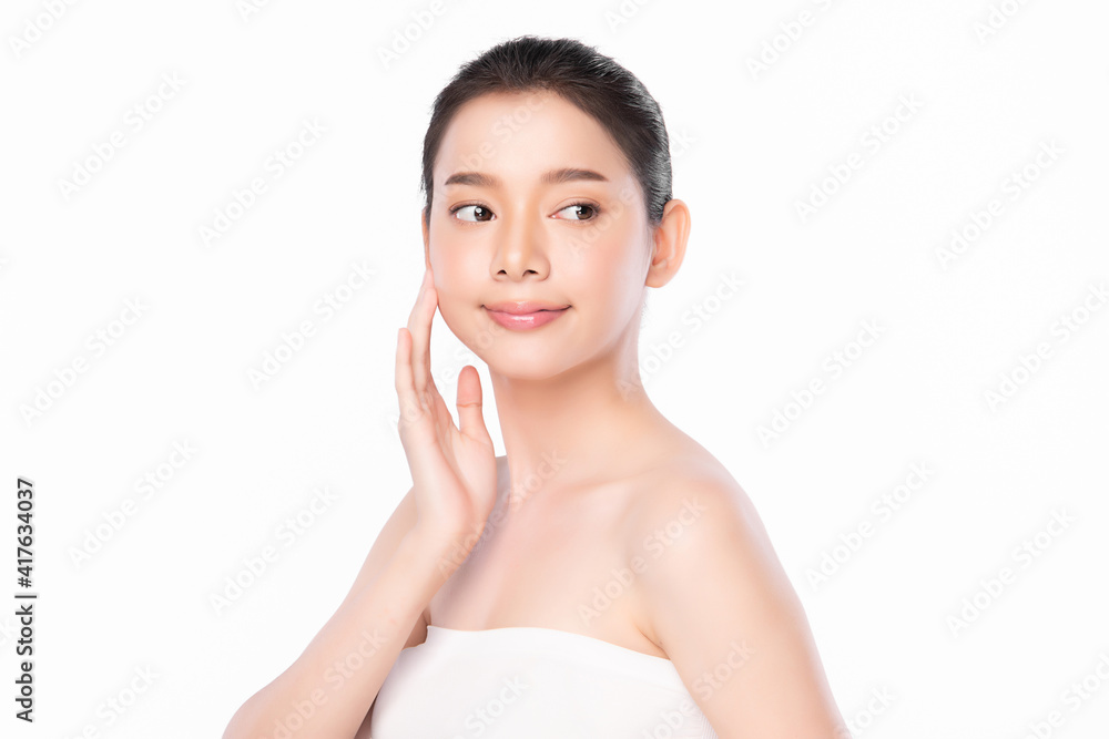 Beautiful young asian woman with clean fresh skin on white background ...