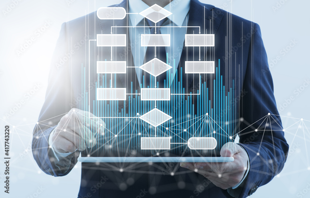 Process and flowchart. Businessman using tablet computer. Network ...