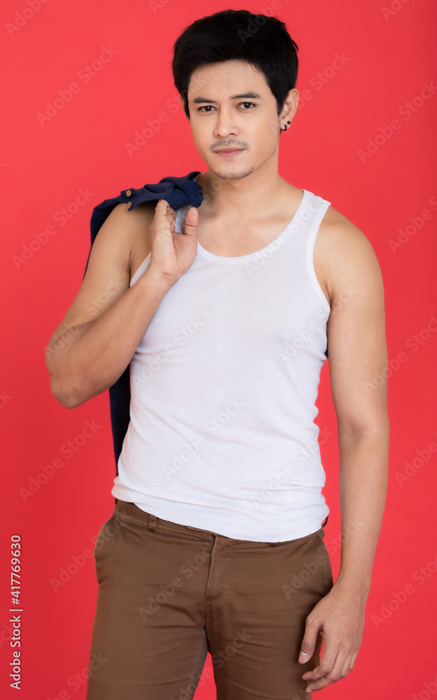 Young Asian Man Take Off Your Shirt And Put It On Your Shoulders Wear
