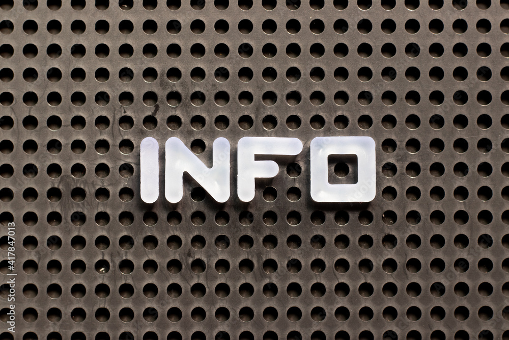 White color letter in word info on black pegboard background Stock ...