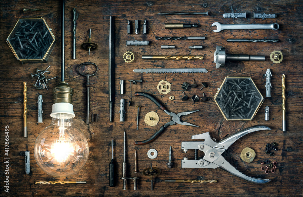 Collection of vintage tools, nstrument, device displayed on a wood ...
