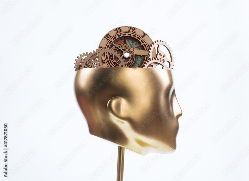 Human head with a gear mechanism in the head. Stock Photo | Adobe Stock