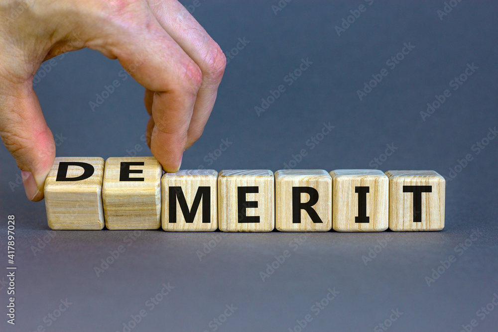 Demerit or merit symbol. Businessman turns wooden cubes and changes ...