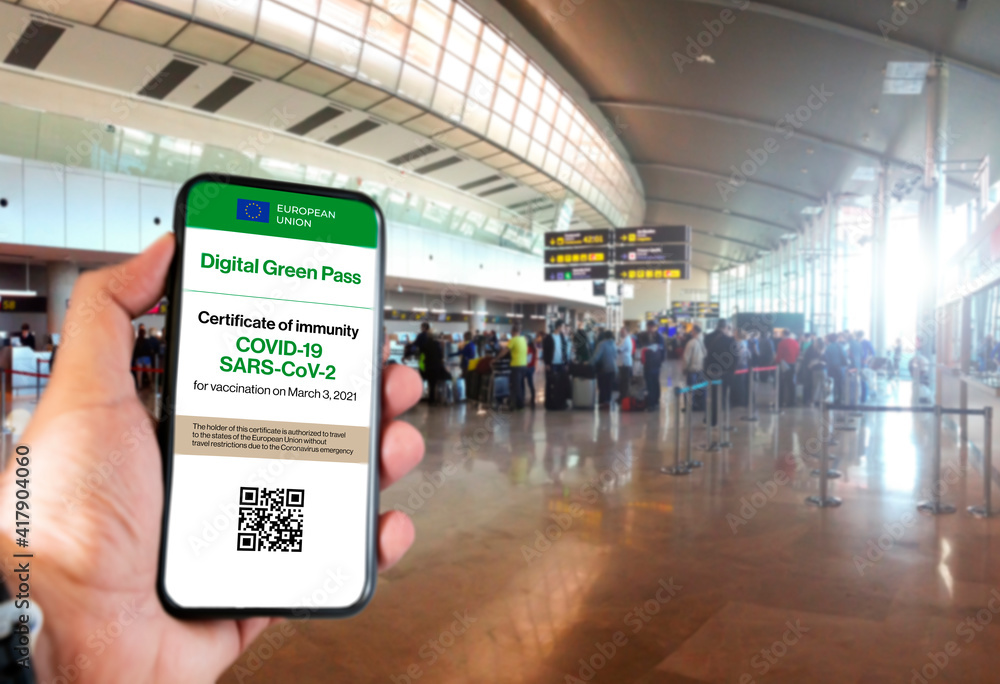 The digital green pass of the european union with the QR code on the ...