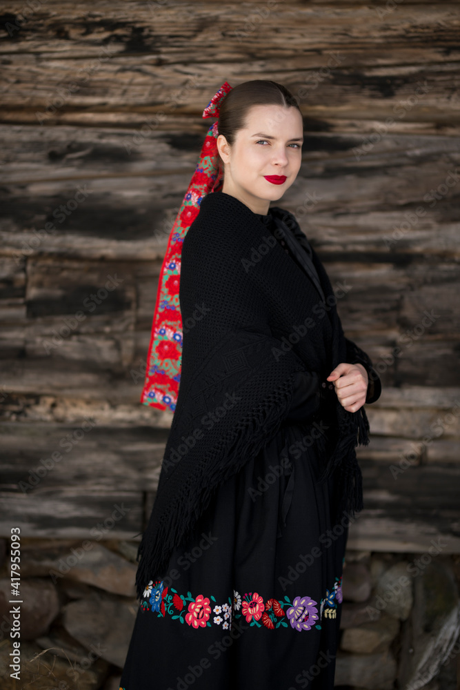 Young beautiful slovak woman in traditional dress. Slovak folklore ...