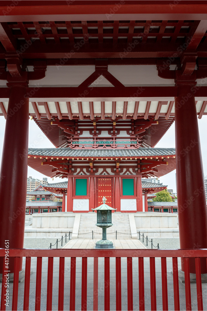 Five-storied pagoda looking through chumon gate of Shitennoji temple in ...