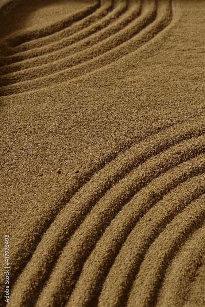 Draw a circle-shaped line on the sand Stock Photo | Adobe Stock