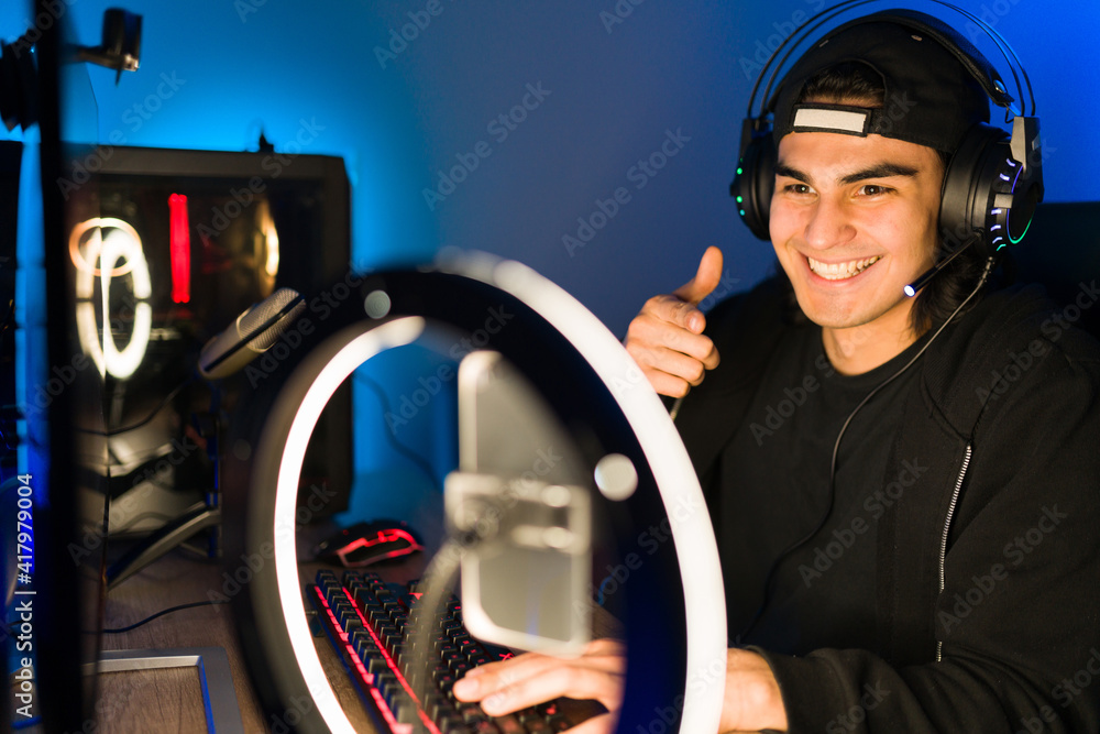 Winner gamer live streaming and talking to his online viewers Stock ...