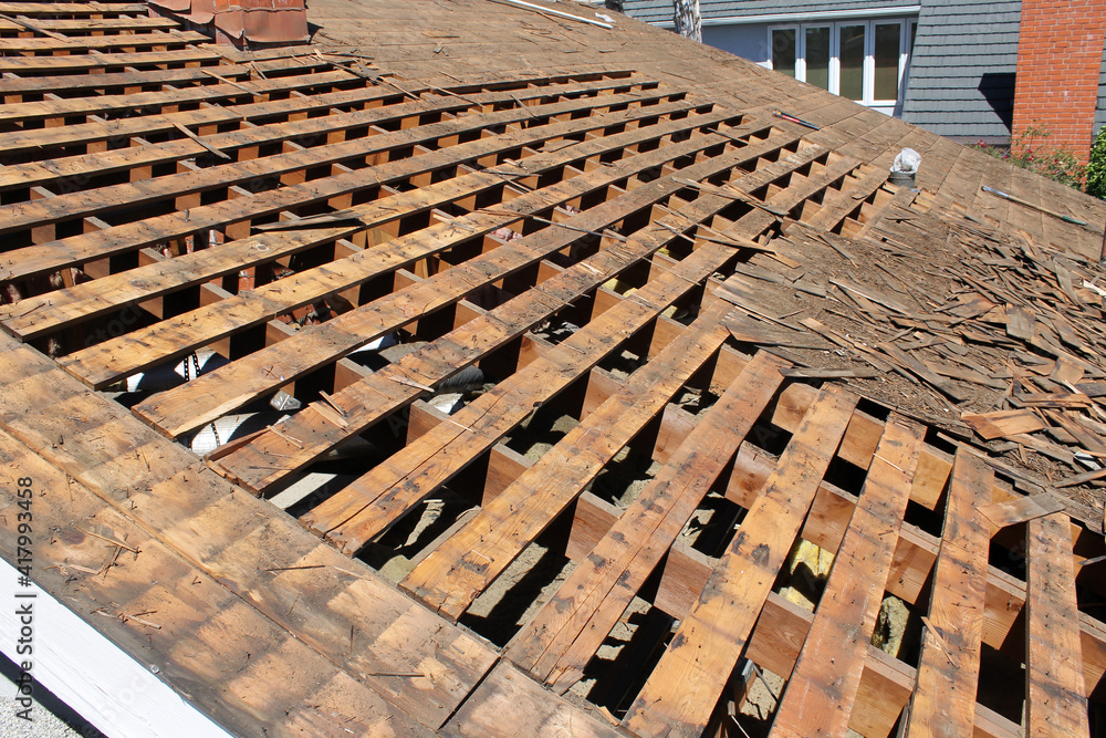 Demolition and removal of an Old Asphalt Single roof that was installed ...