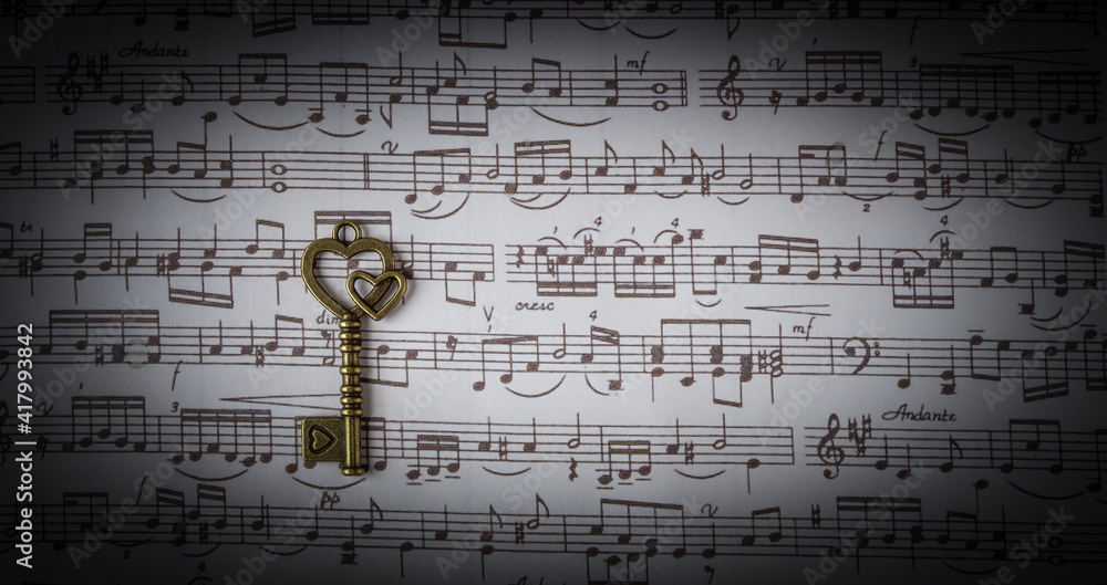 Key shapes making a abstract background using bronze antique keys layed ...