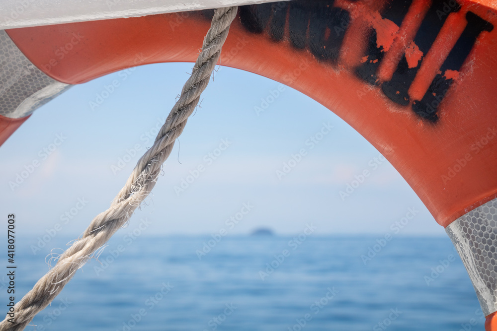 red lifeline on ship on a background of sea ocean and sky Stock Photo ...