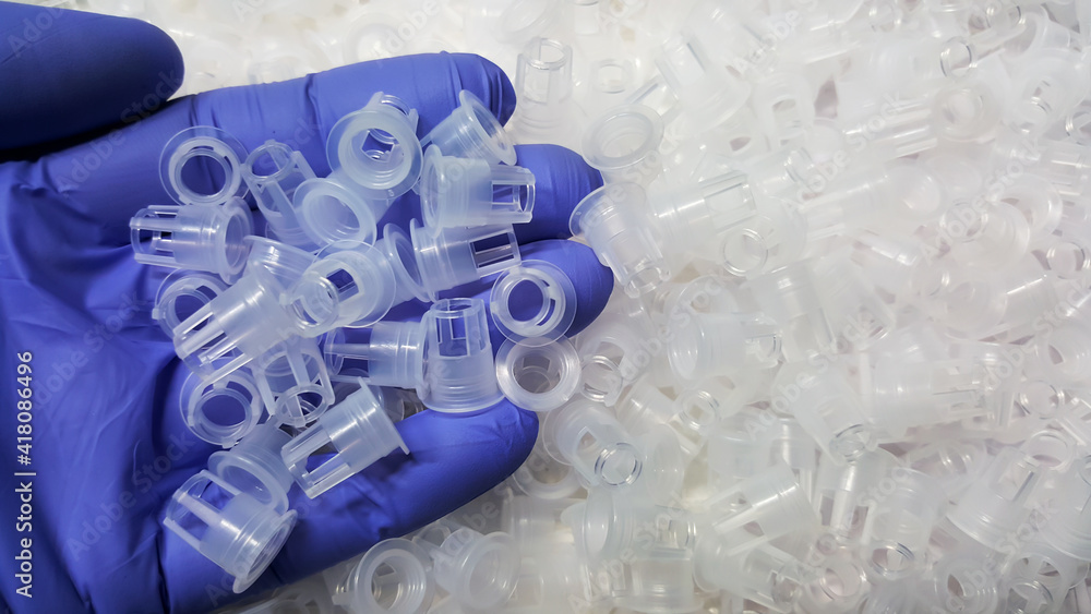 Medical plastic product parts, from injection molding machine, of the ...