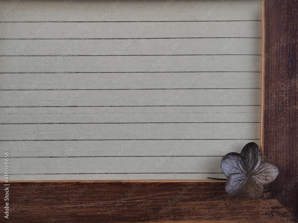 Wooden vintage photo frame with dried flowers. An empty brown frame ...