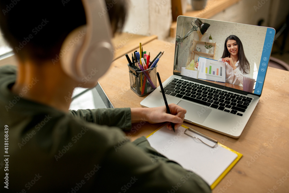 Little boy studying by group video call, use video conference with ...