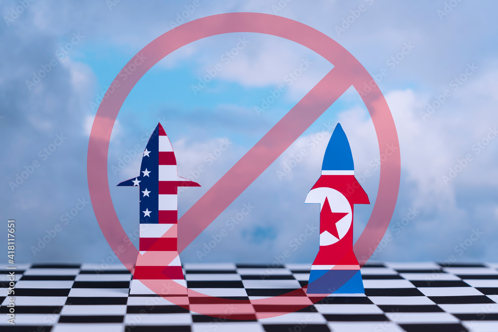 Rockets with the USA flag and the North Korea flag on a chessboard ...
