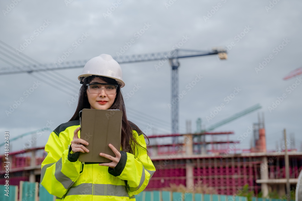 Asian engineer working at site of a large building project,Thailand ...