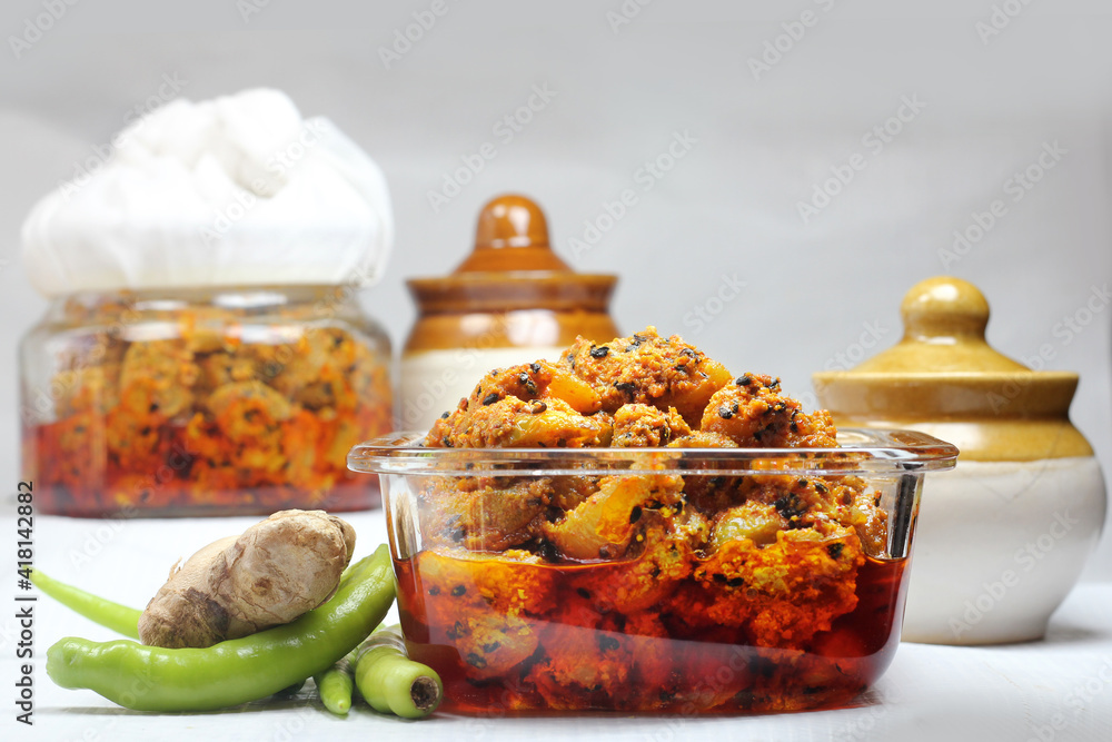 Homemade Indian gooseberry pickle made with chilly,ginger and ...