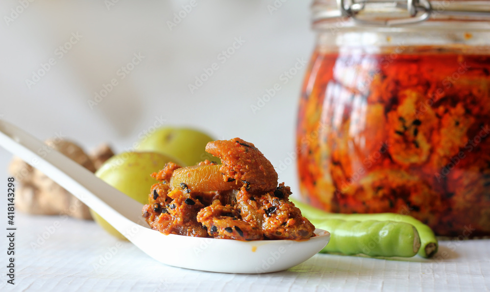 Homemade Indian gooseberry pickle made with chilly,ginger and ...