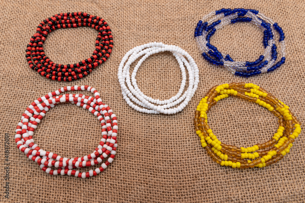 Representative photograph of necklaces of orishas of the Yoruba ...