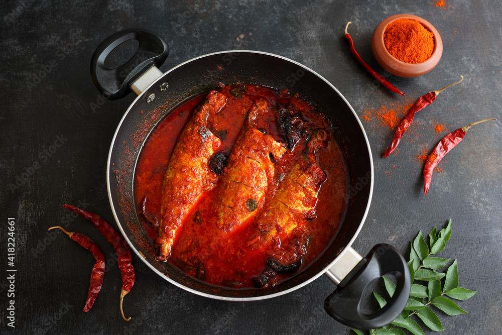 Spicy Mackerel fish curry gravy , cooking spicy Kerala fish curry ...